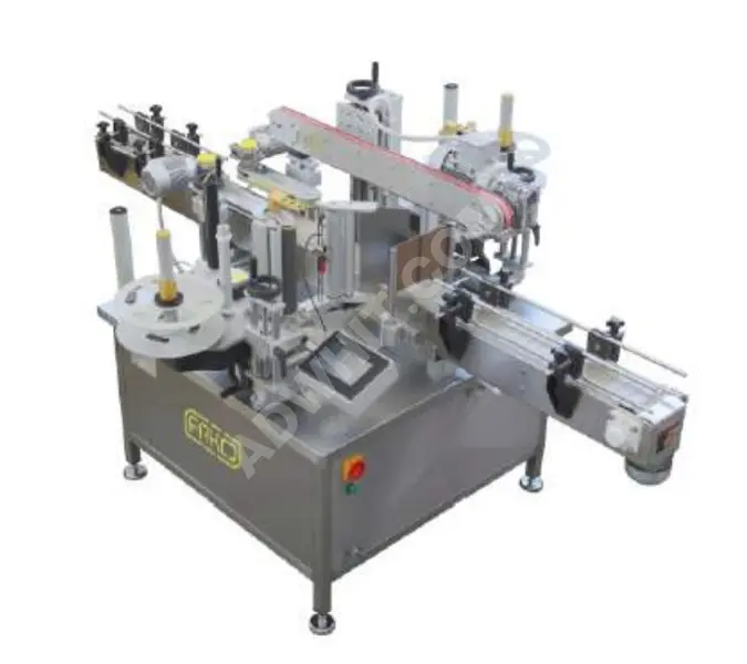 A machine for labeling the front and back surfaces with a capacity of ...